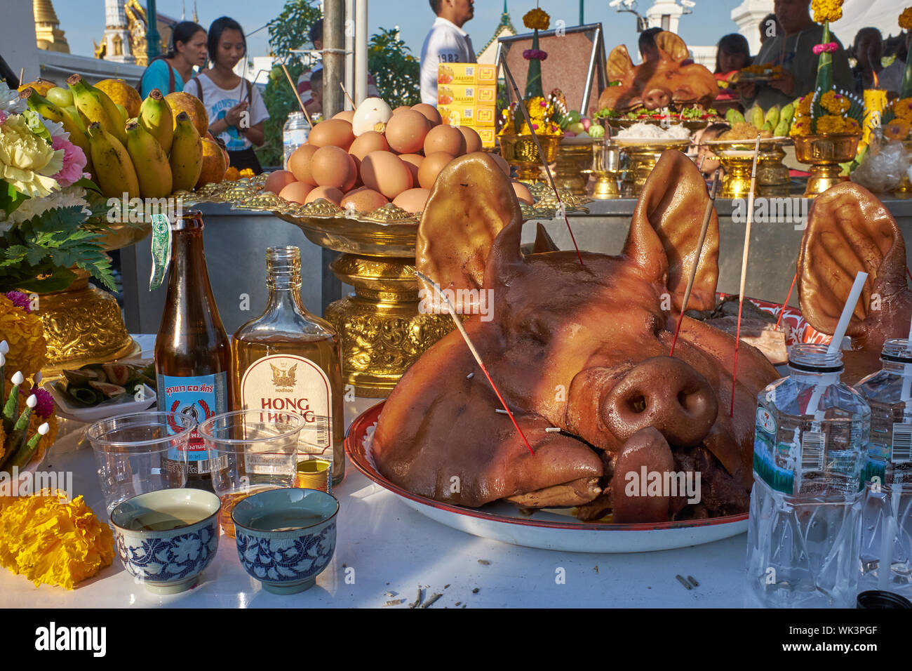 Offerings to the guardian spirit of Bangkok, Thailand: pigs' heads ...