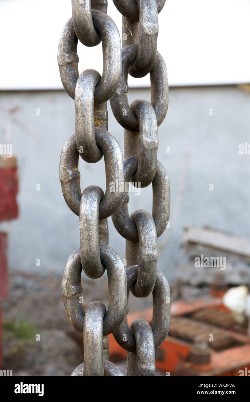 Vertical detail shot of heavy chain link on a construction site Stock ...
