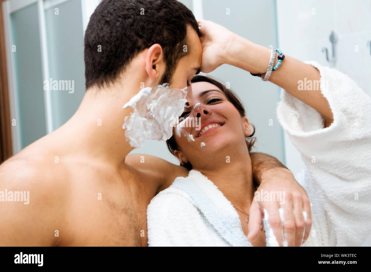 Woman shaving boyfriend face hi-res stock photography and images - Alamy