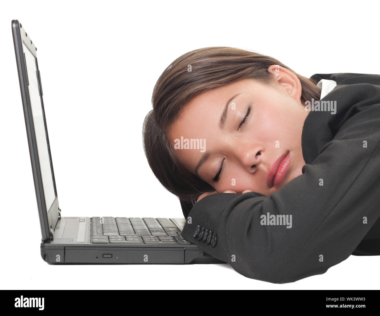 Woman sleeping on laptop taking a power nap during work. Isolated on ...