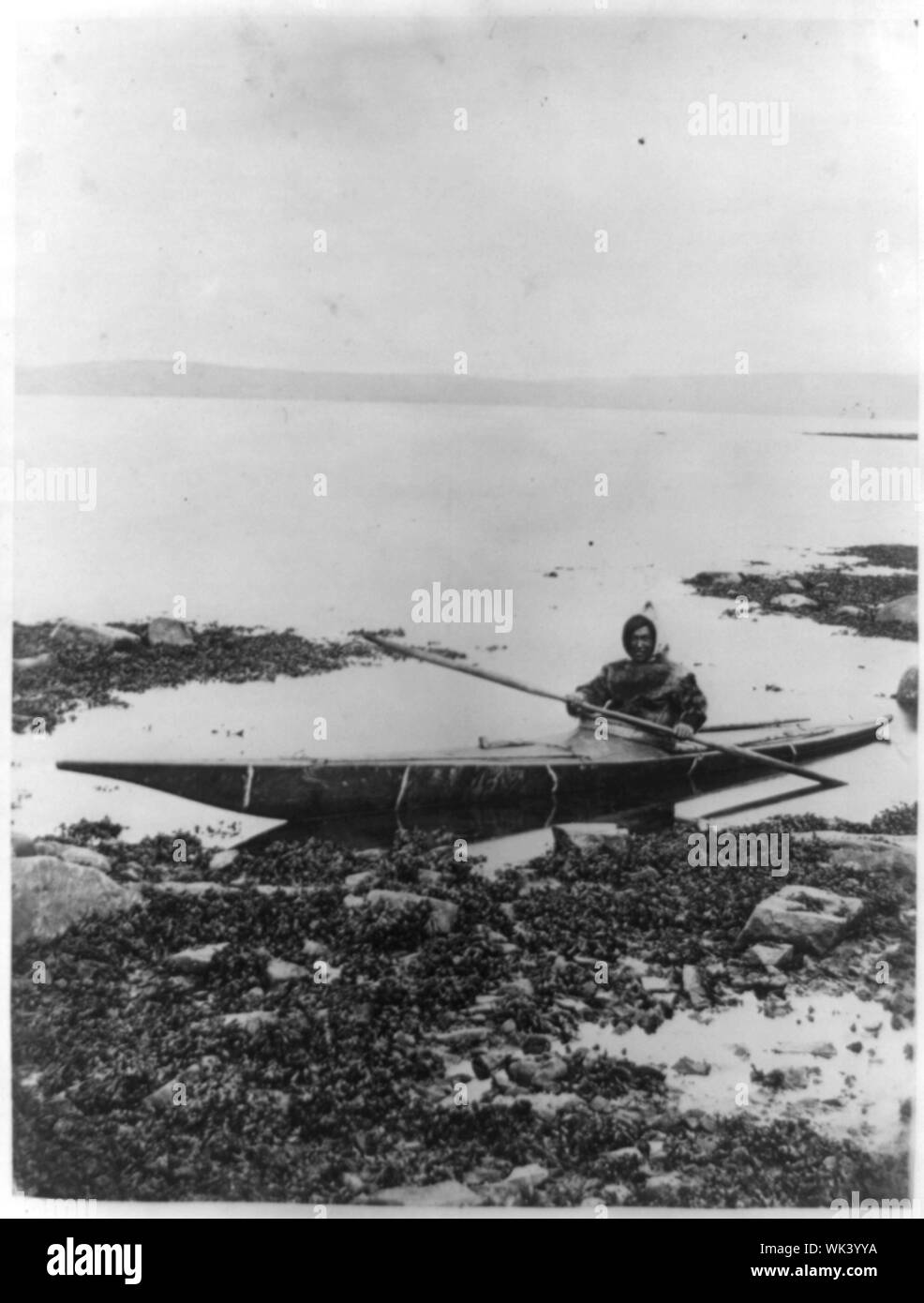 Man in water holding Black and White Stock Photos & Images - Alamy