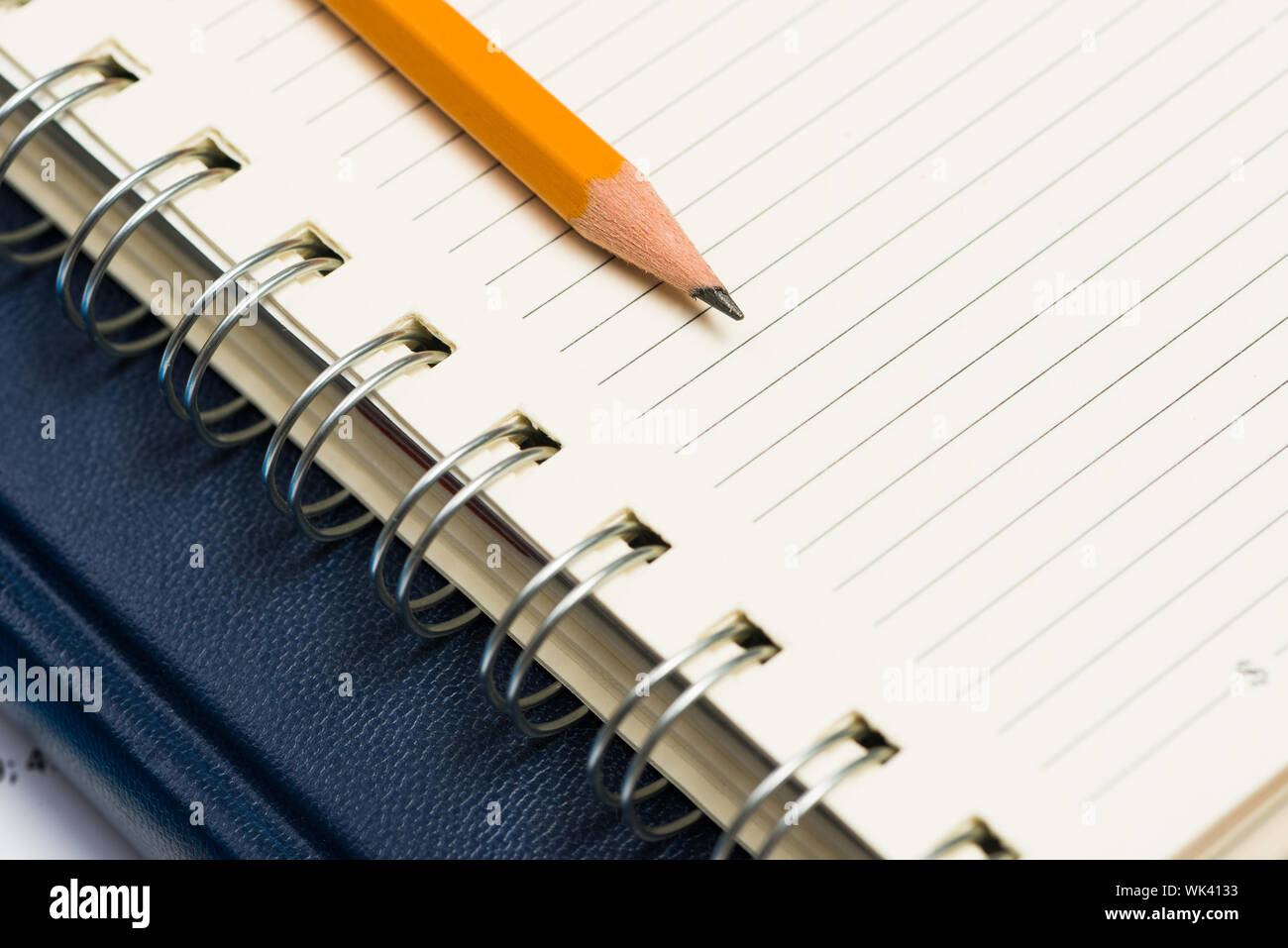 notebooks and pencil on the desk Stock Photo - Alamy