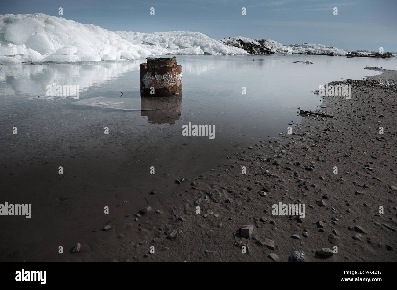 Abandoned rusty oil well at the northern location Stock Photo - Alamy