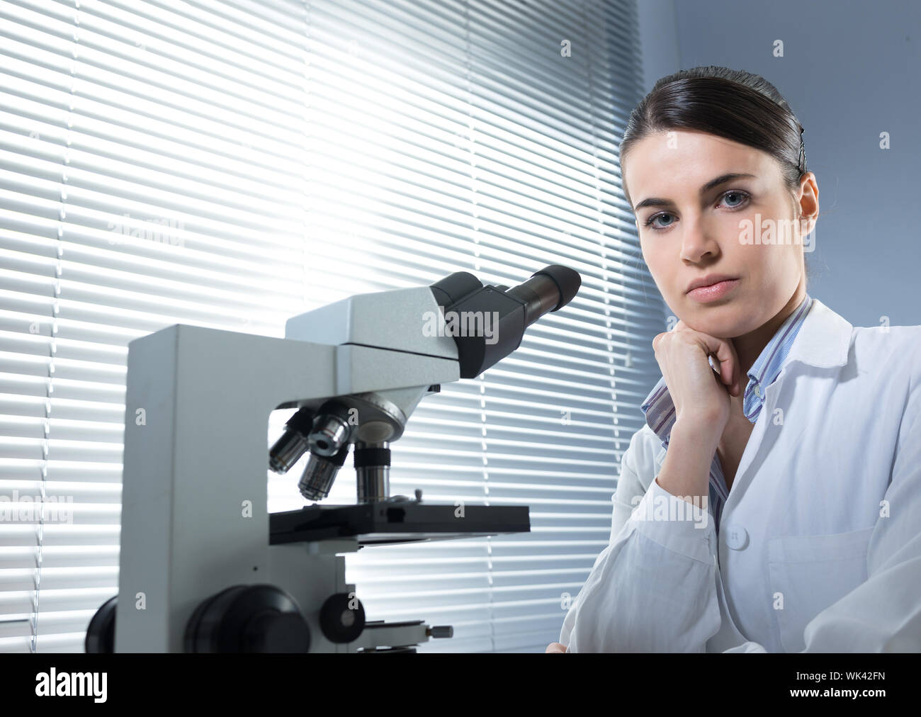 Young female researcher working hi-res stock photography and images - Alamy