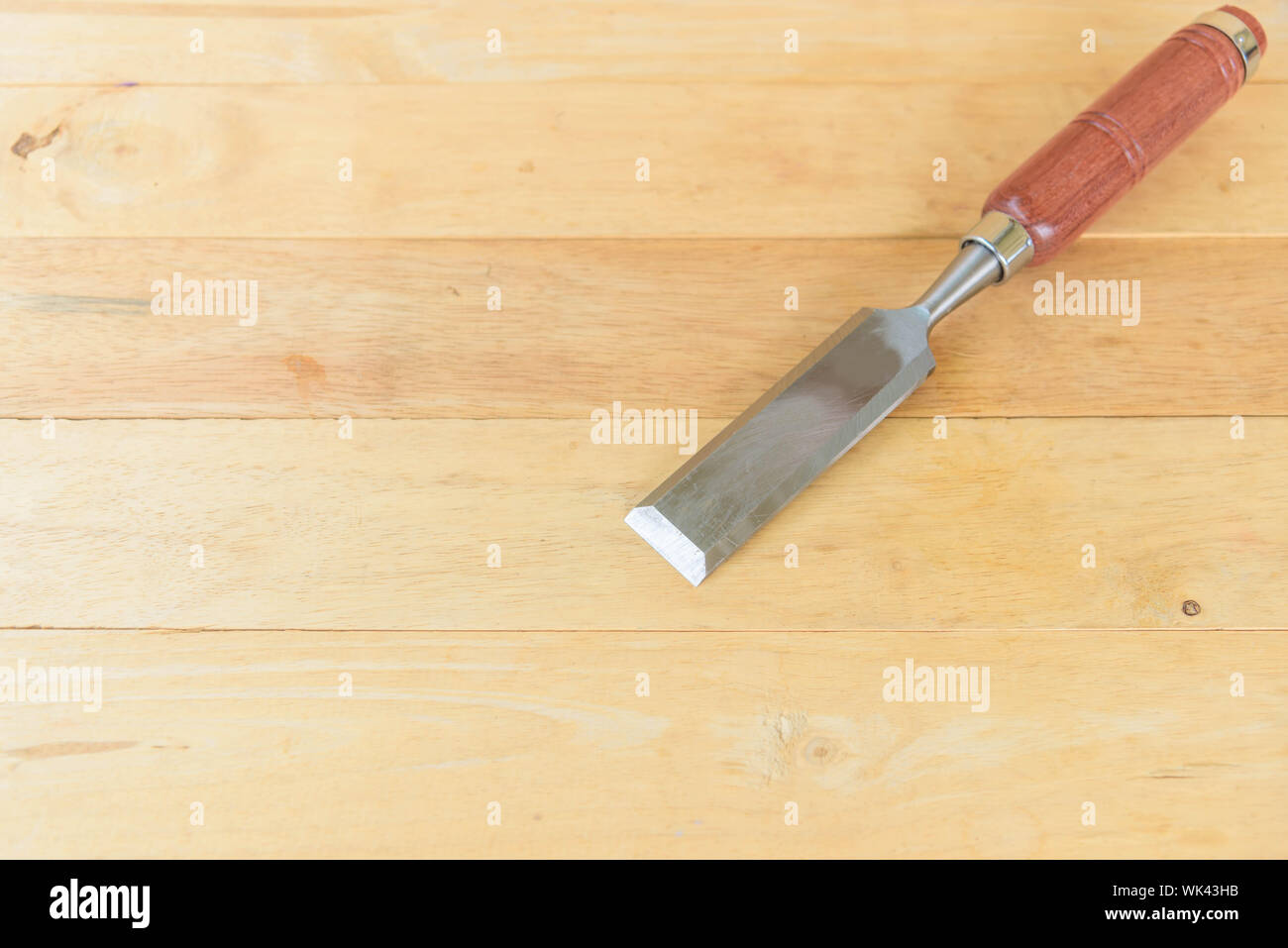 chisel latch on the wood plate Stock Photo - Alamy
