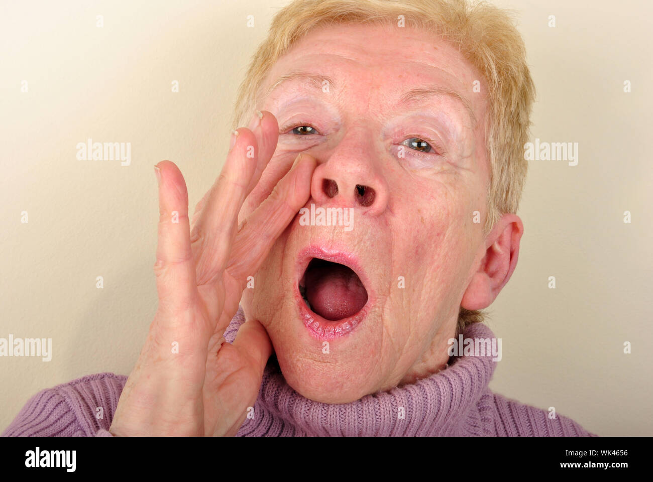 woman is shouting with her open mouth Stock Photo - Alamy