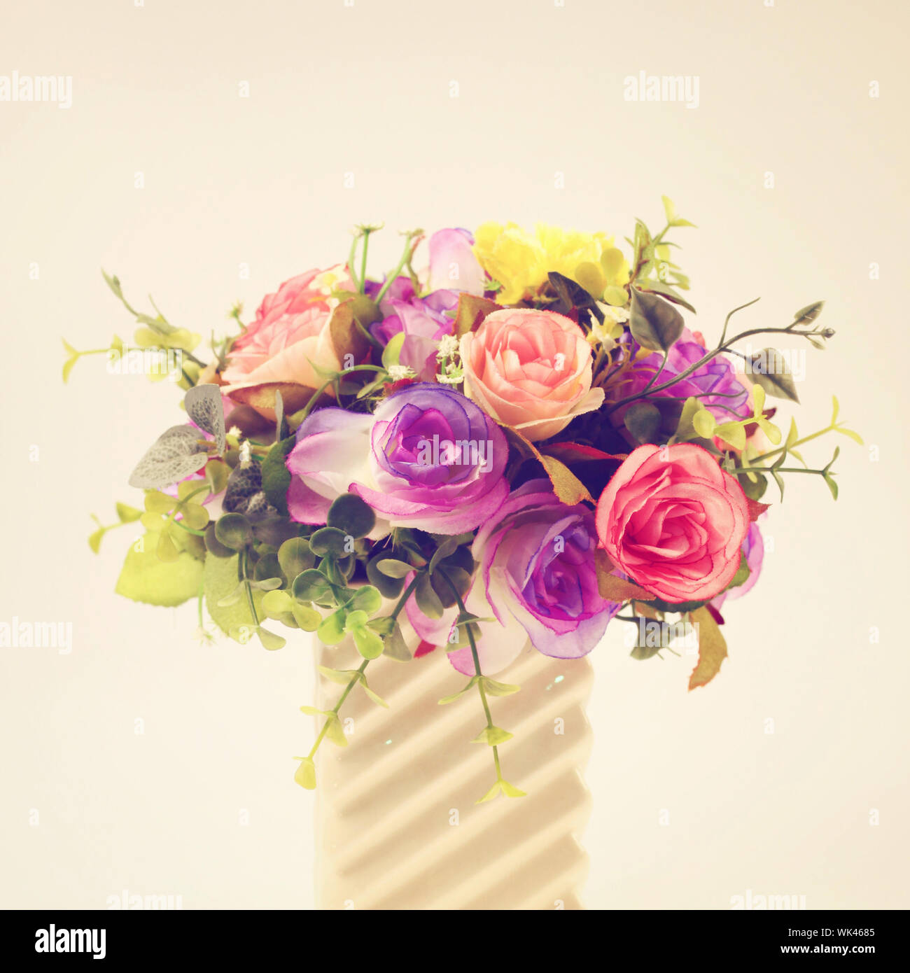 Plastic flowers for decoration with retro filter effect Stock Photo - Alamy