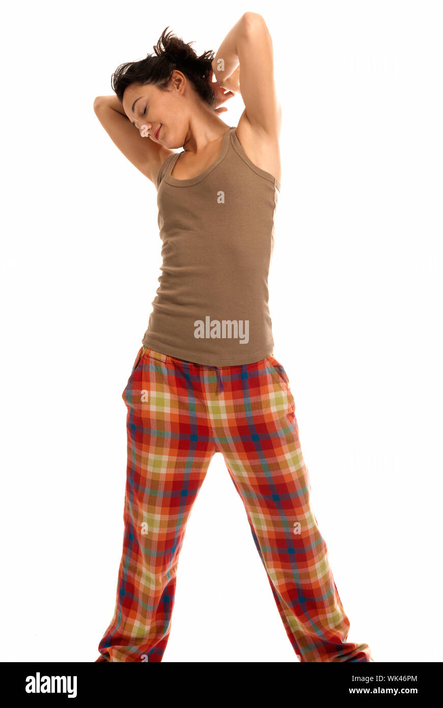 young woman be sleepy wearing pajamas isolated on white background ...