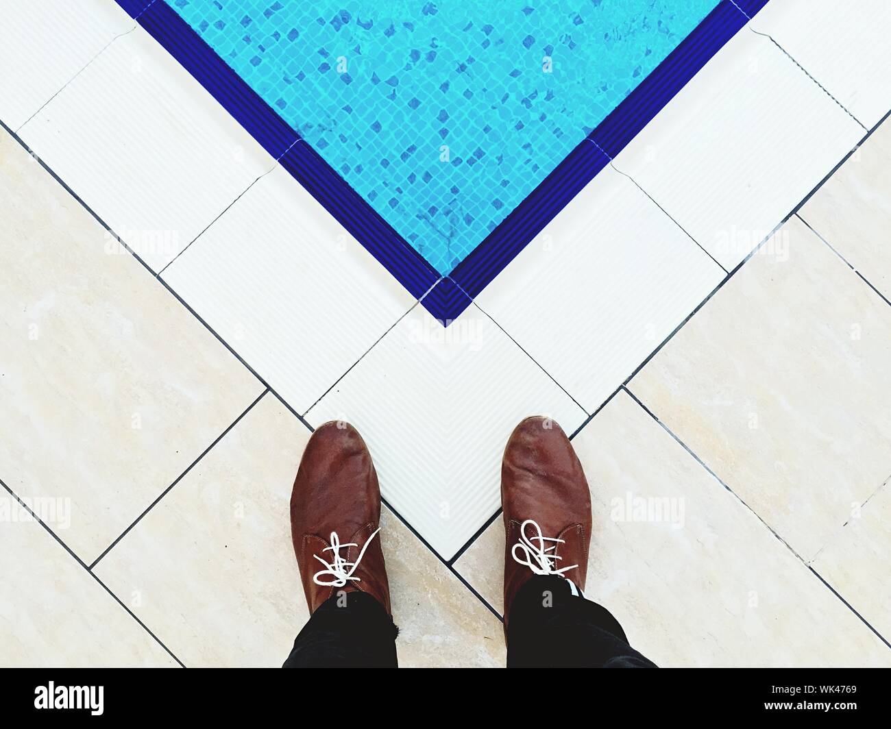Man standing pool hi-res stock photography and images - Alamy