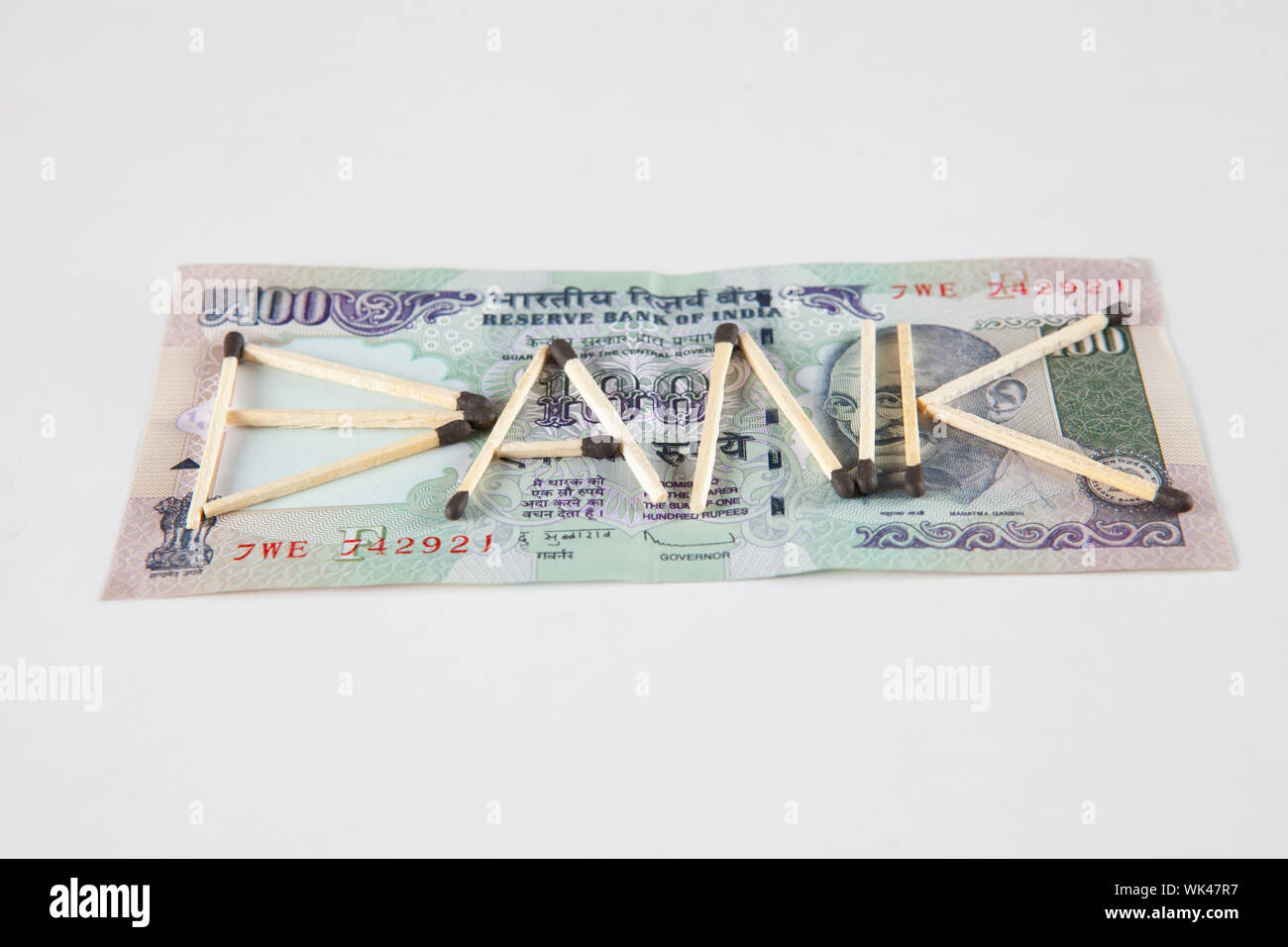 Bank text on an Indian one thousand rupees note isolated on white ...