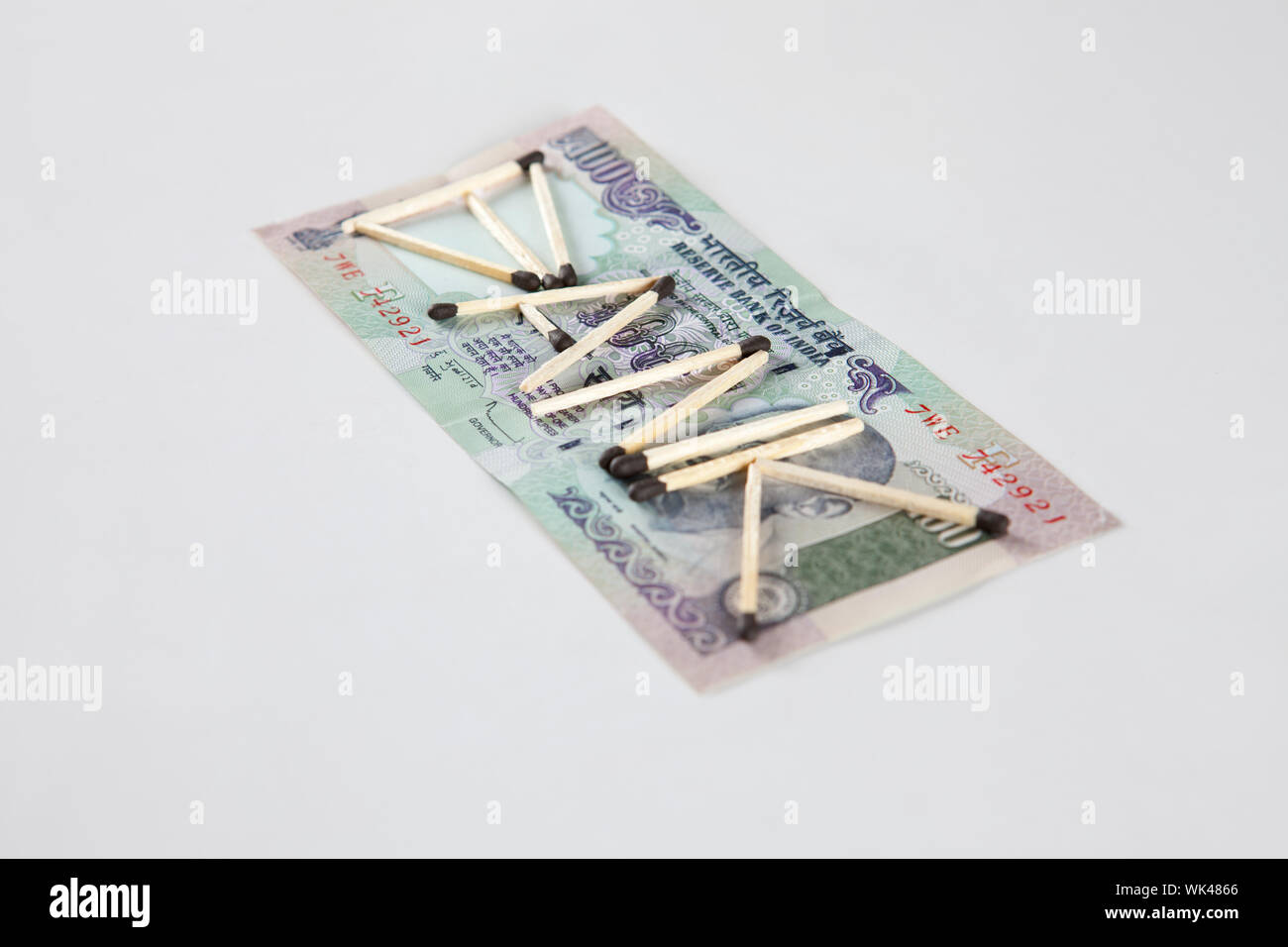 Bank text on an Indian one thousand rupees note isolated on white ...