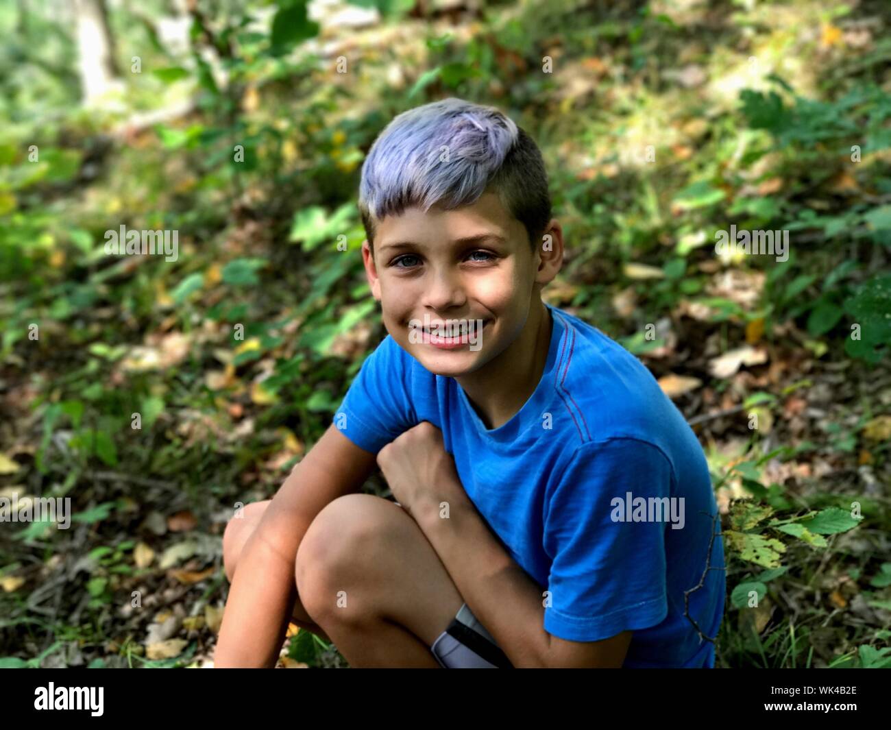 Boy portrait smiling outdoors hi-res stock photography and images - Alamy