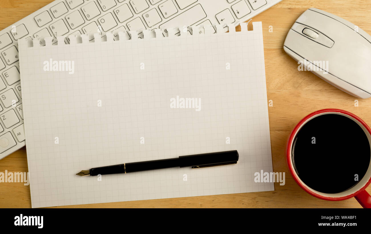 Overhead of graph paper and pen on a desk Stock Photo - Alamy