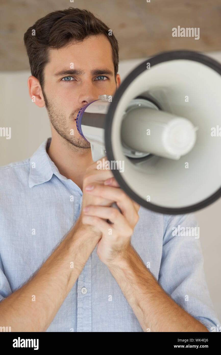 Businessman talking through megaphone hi-res stock photography and ...
