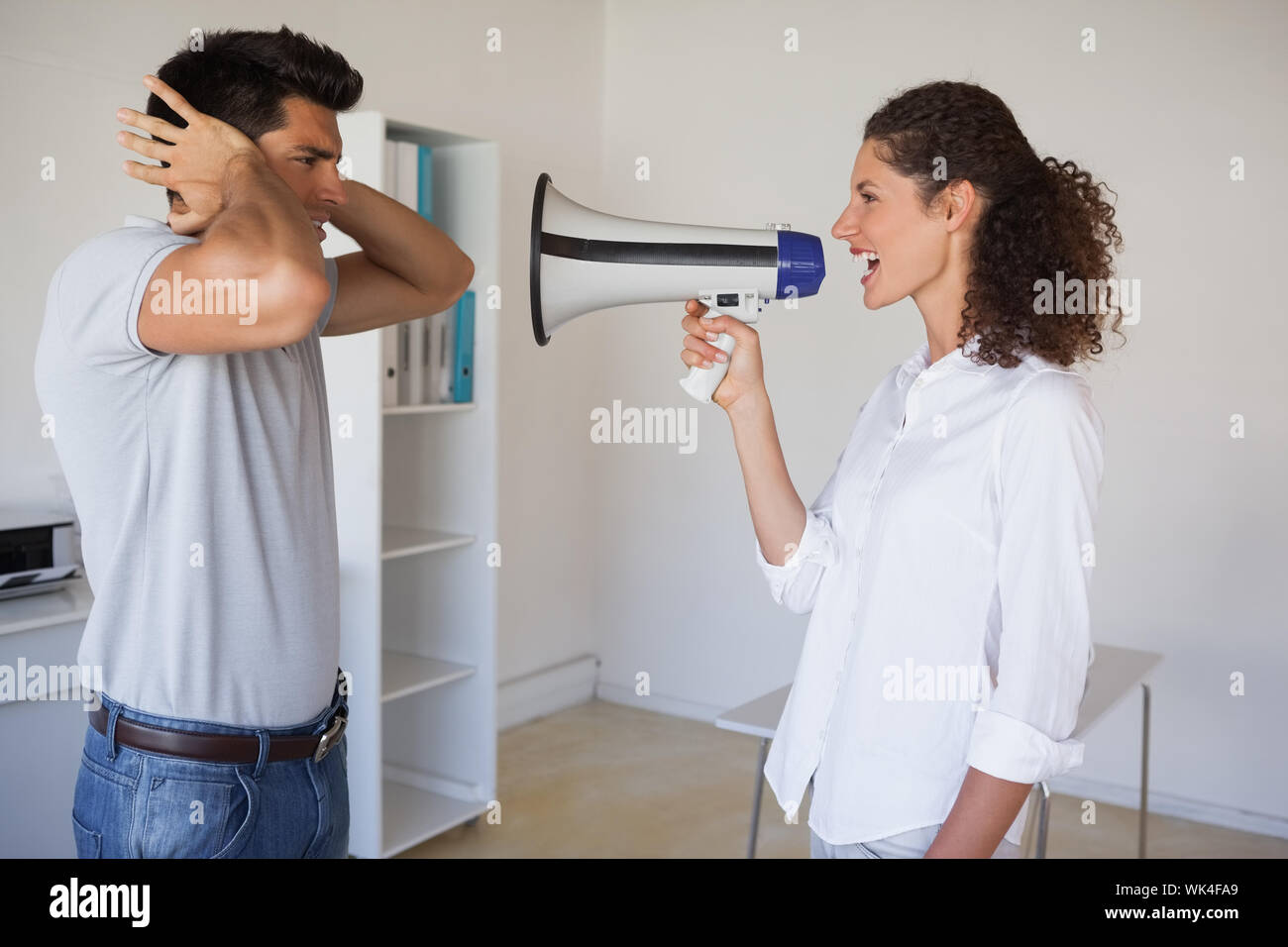 Man holding megaphone ears hi-res stock photography and images - Alamy