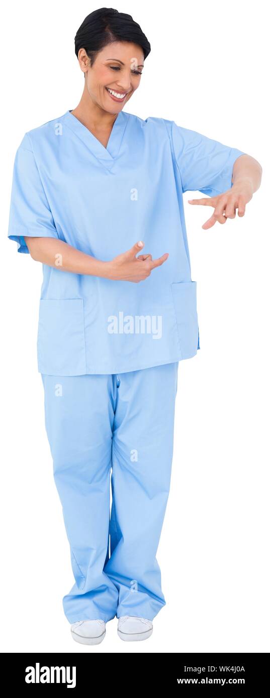 Pretty dark haired surgeon on white background Stock Photo - Alamy