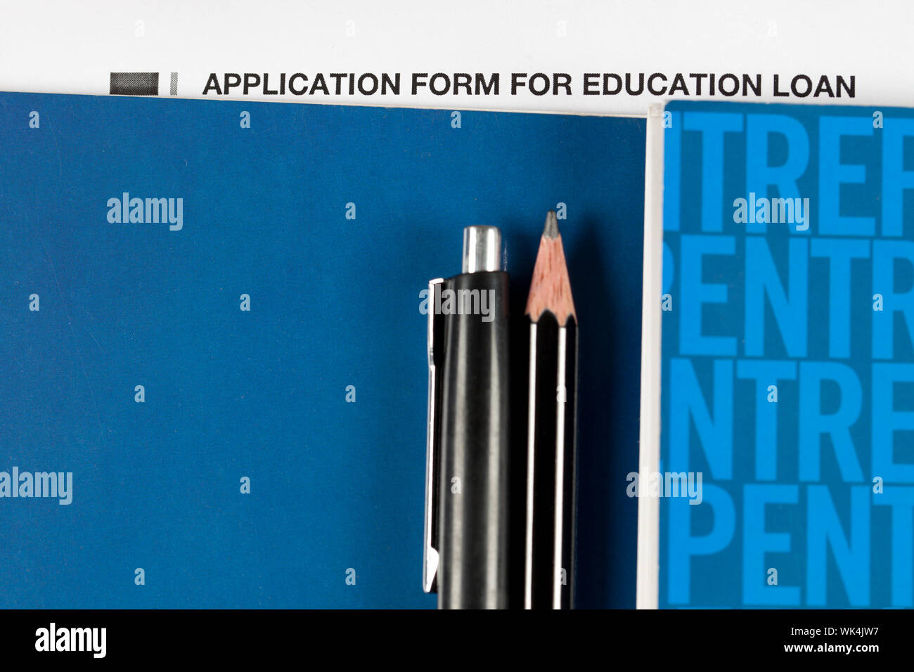 Education Loan application form with a pen and pencil Stock Photo - Alamy