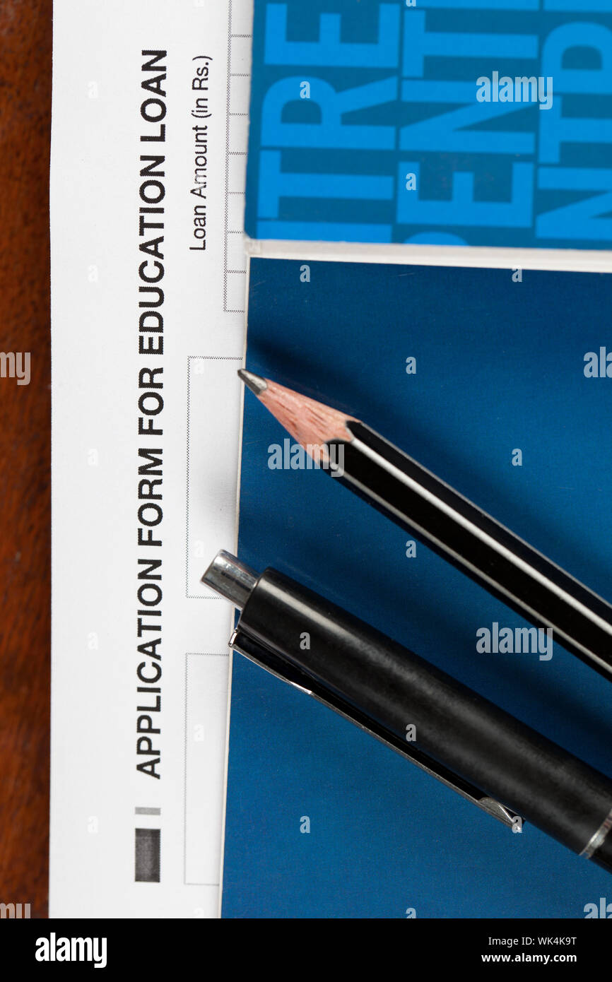 Education Loan application form with a pen and pencil Stock Photo - Alamy
