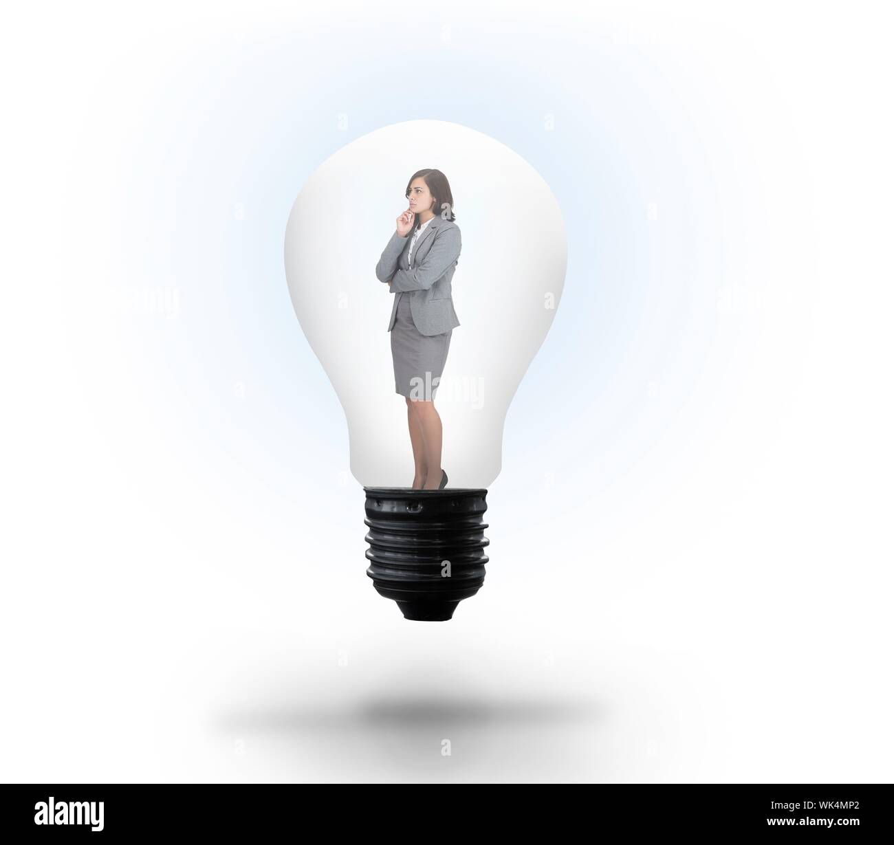 Thinking businesswoman in light bulb on white background Stock Photo ...