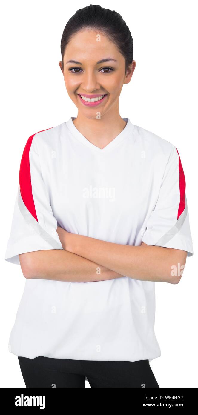 Pretty football fan in white smiling on white background Stock Photo ...