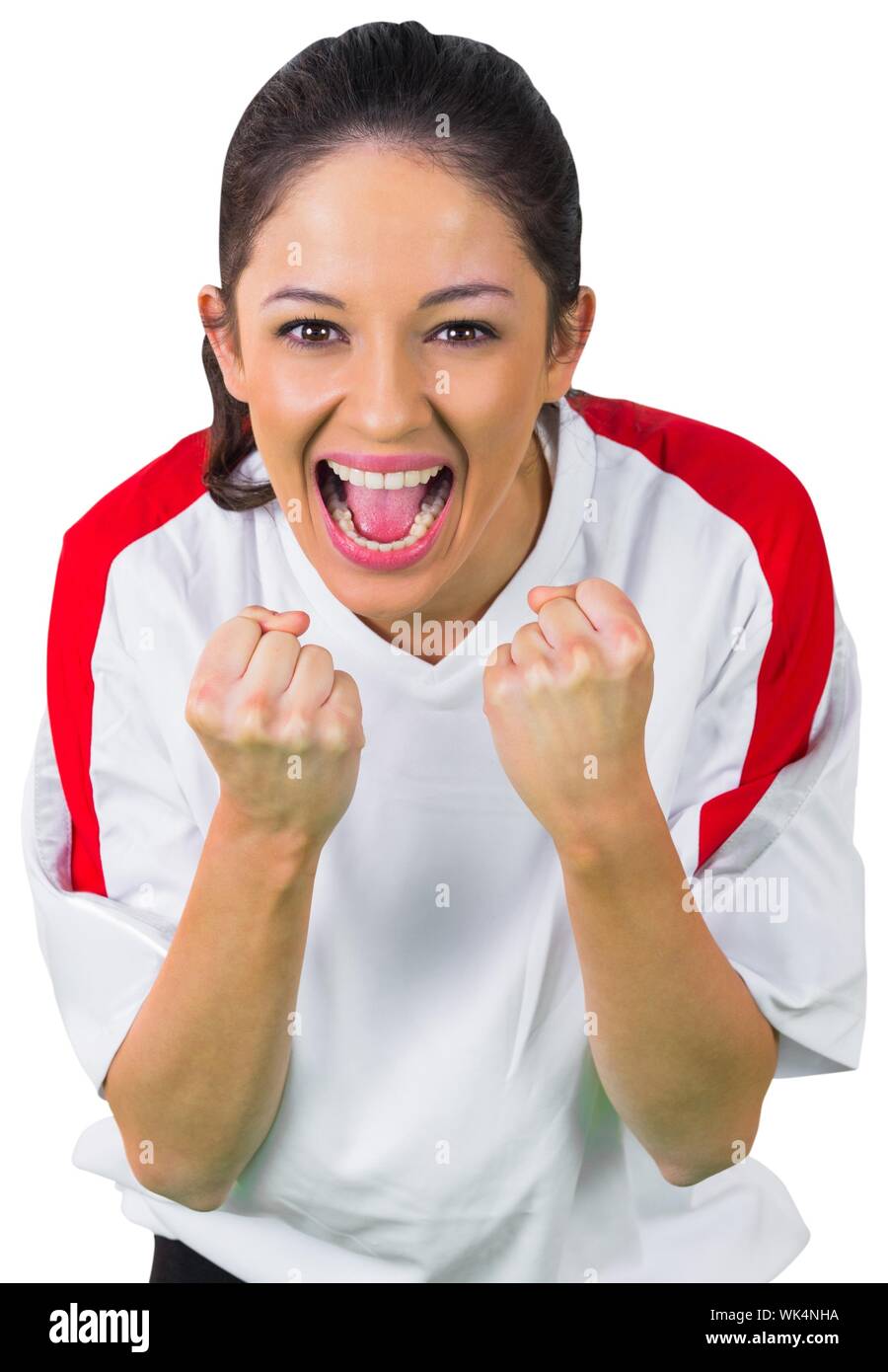 Pretty football fan in white cheering on white background Stock Photo ...