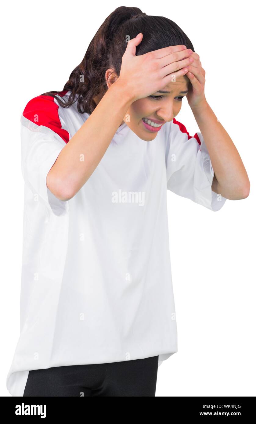 Disappointed football fan in white on white background Stock Photo - Alamy