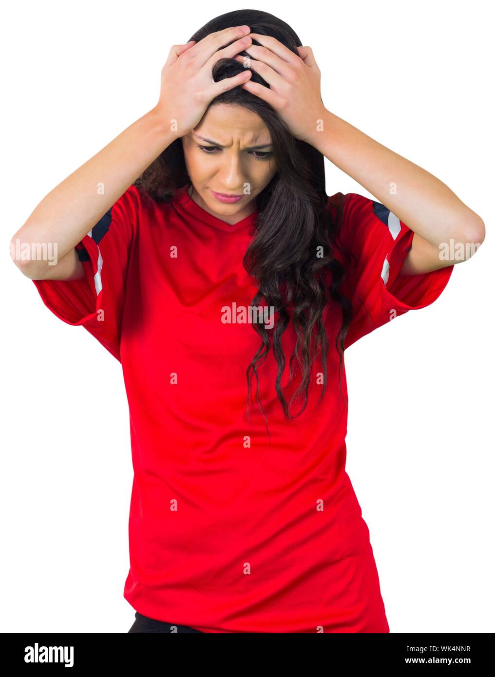 Disappointed football fan in red on white background Stock Photo - Alamy