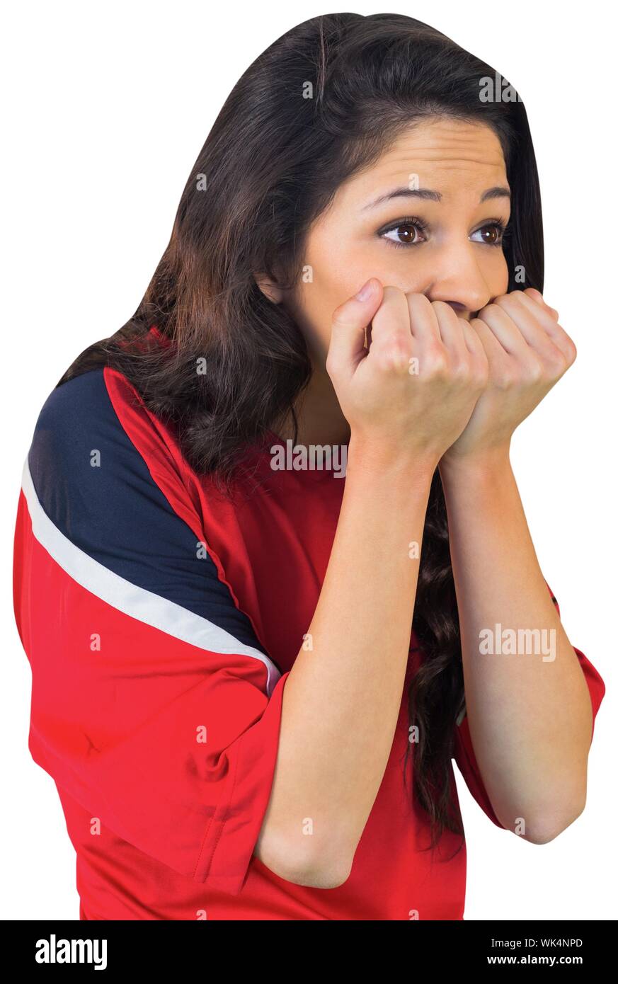 Nervous football fan in red on white background Stock Photo - Alamy