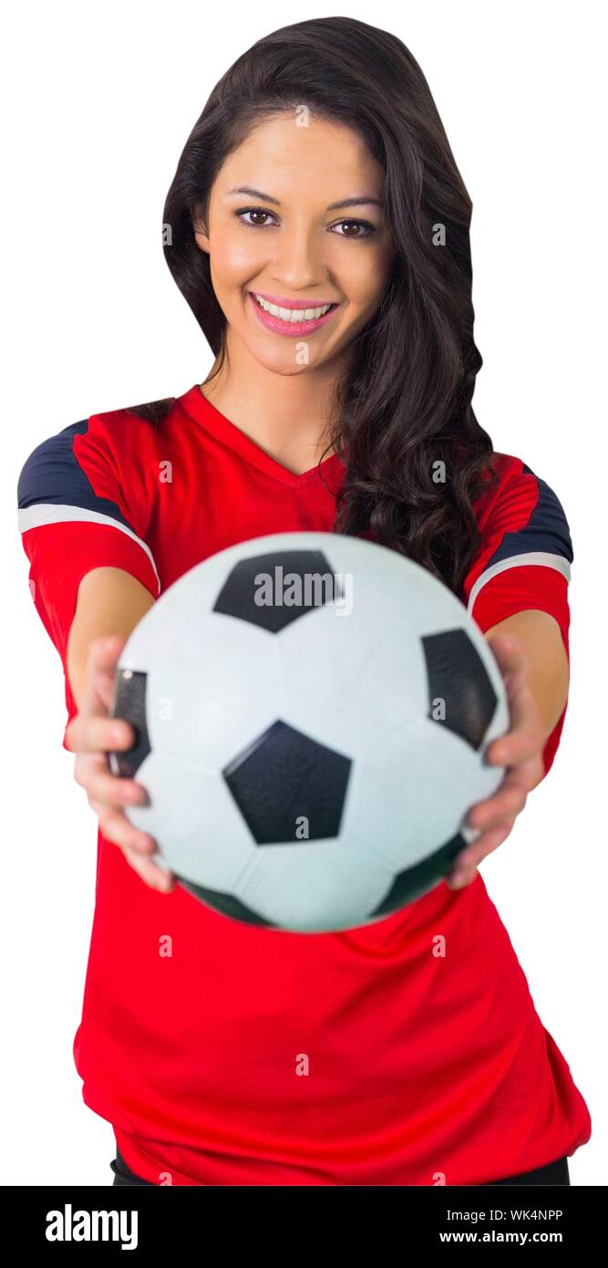 Pretty football fan in red on white background Stock Photo - Alamy