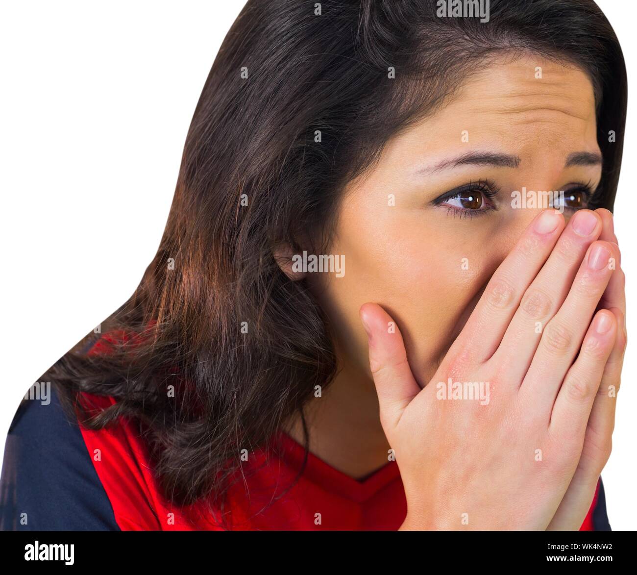 Nervous football fan in red on white background Stock Photo - Alamy