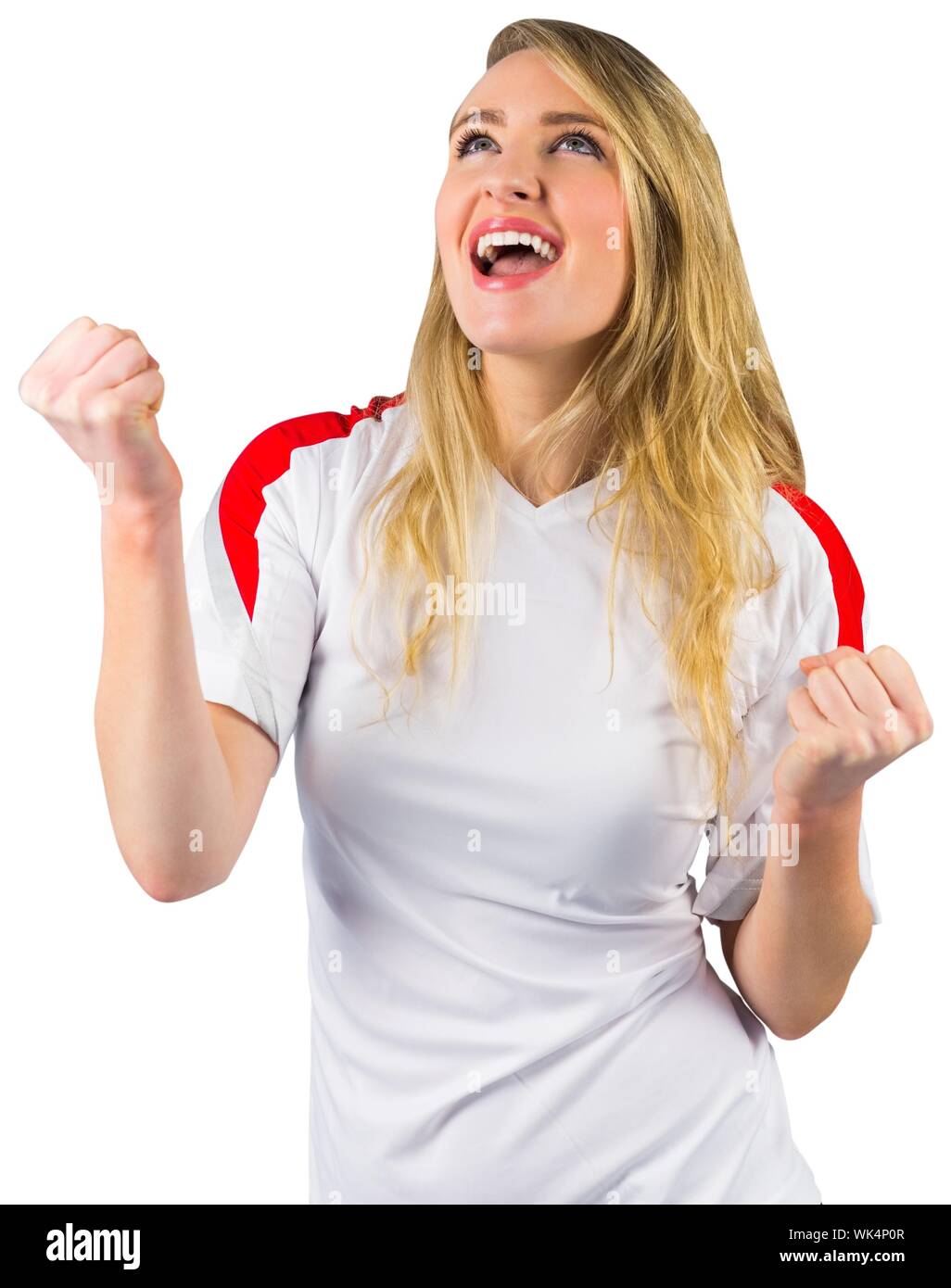 Pretty football fan in white cheering on white background Stock Photo ...