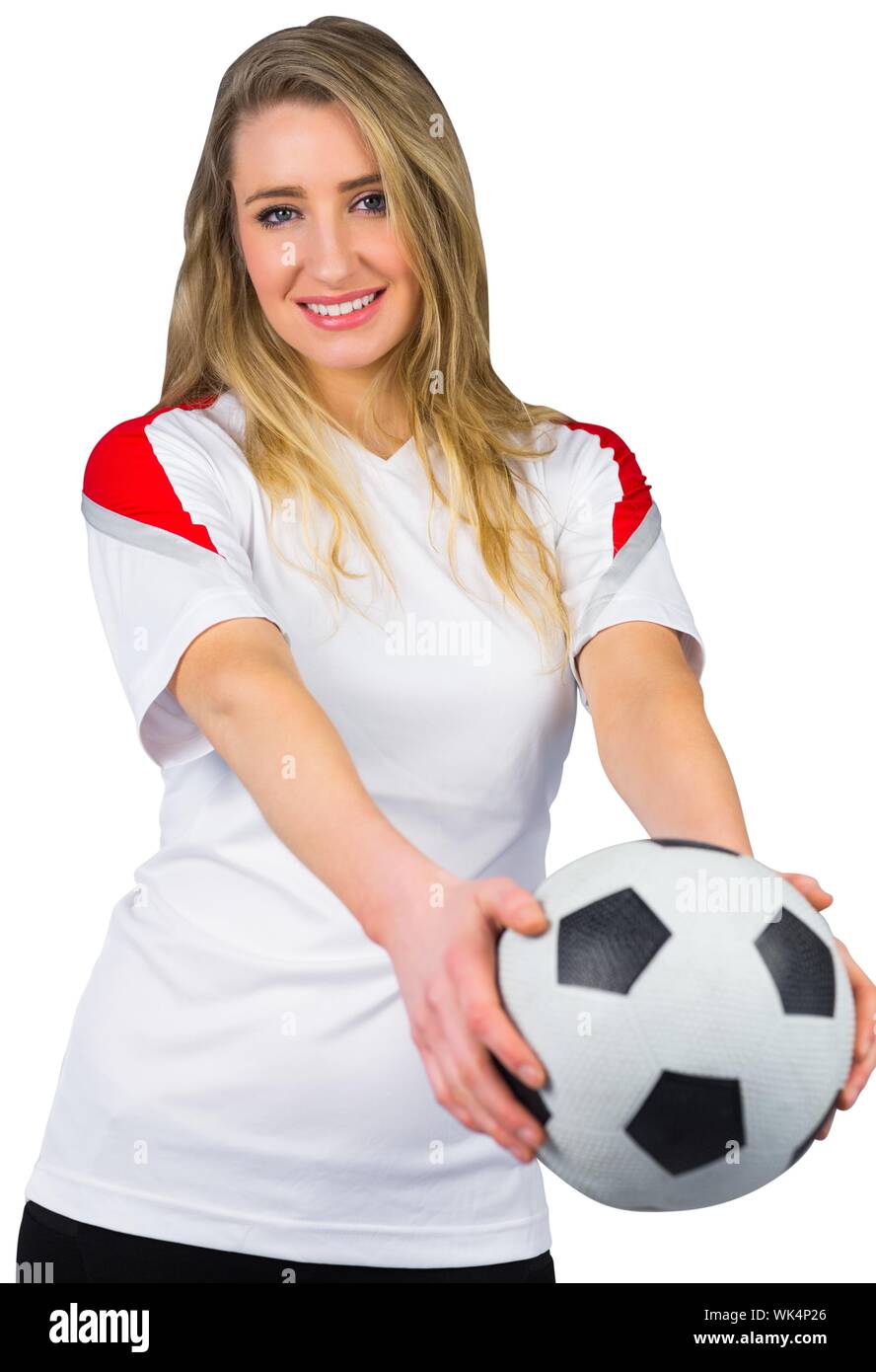 Pretty football fan in white smiling on white background Stock Photo ...