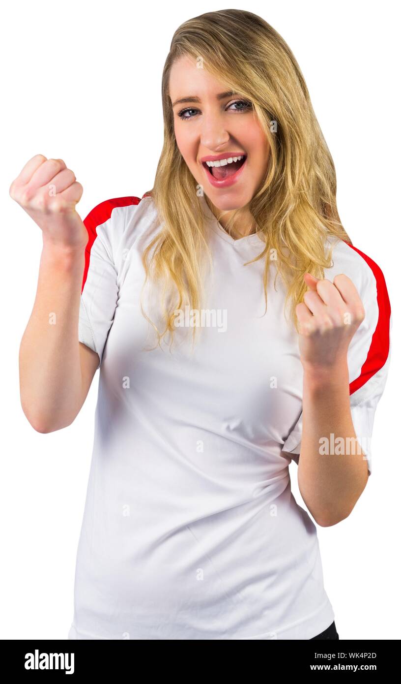 Pretty football fan in white cheering on white background Stock Photo ...