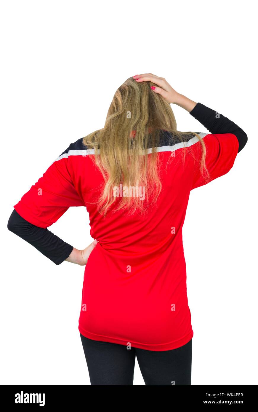 Disappointed football fan in red on white background Stock Photo - Alamy