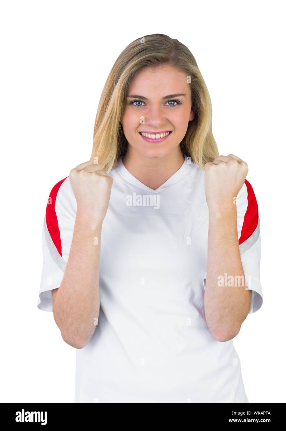 Pretty football fan in white cheering on white background Stock Photo ...
