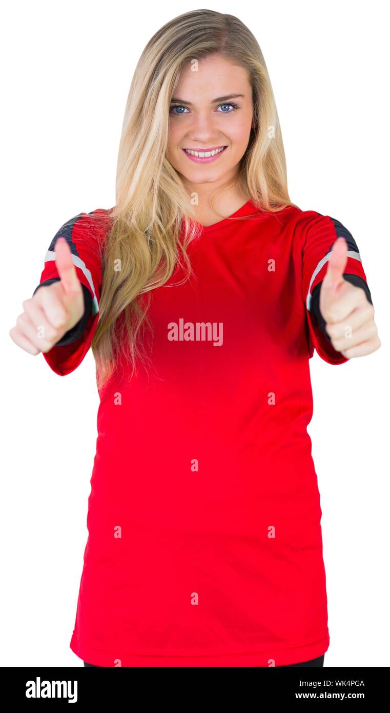 Pretty football fan in red on white background Stock Photo - Alamy