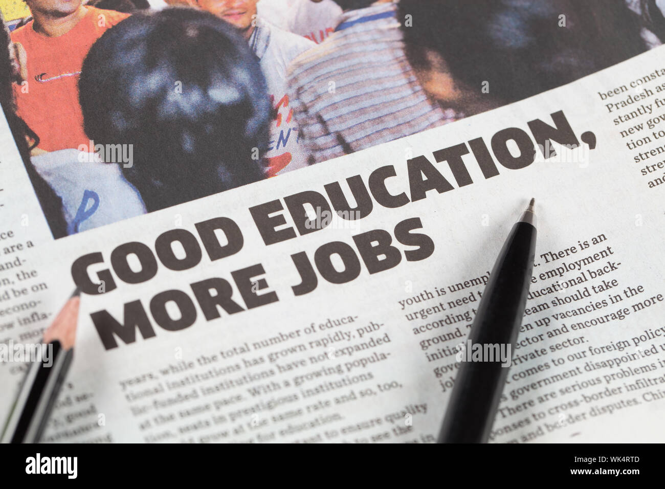 Good education more jobs as a newspaper heading Stock Photo - Alamy