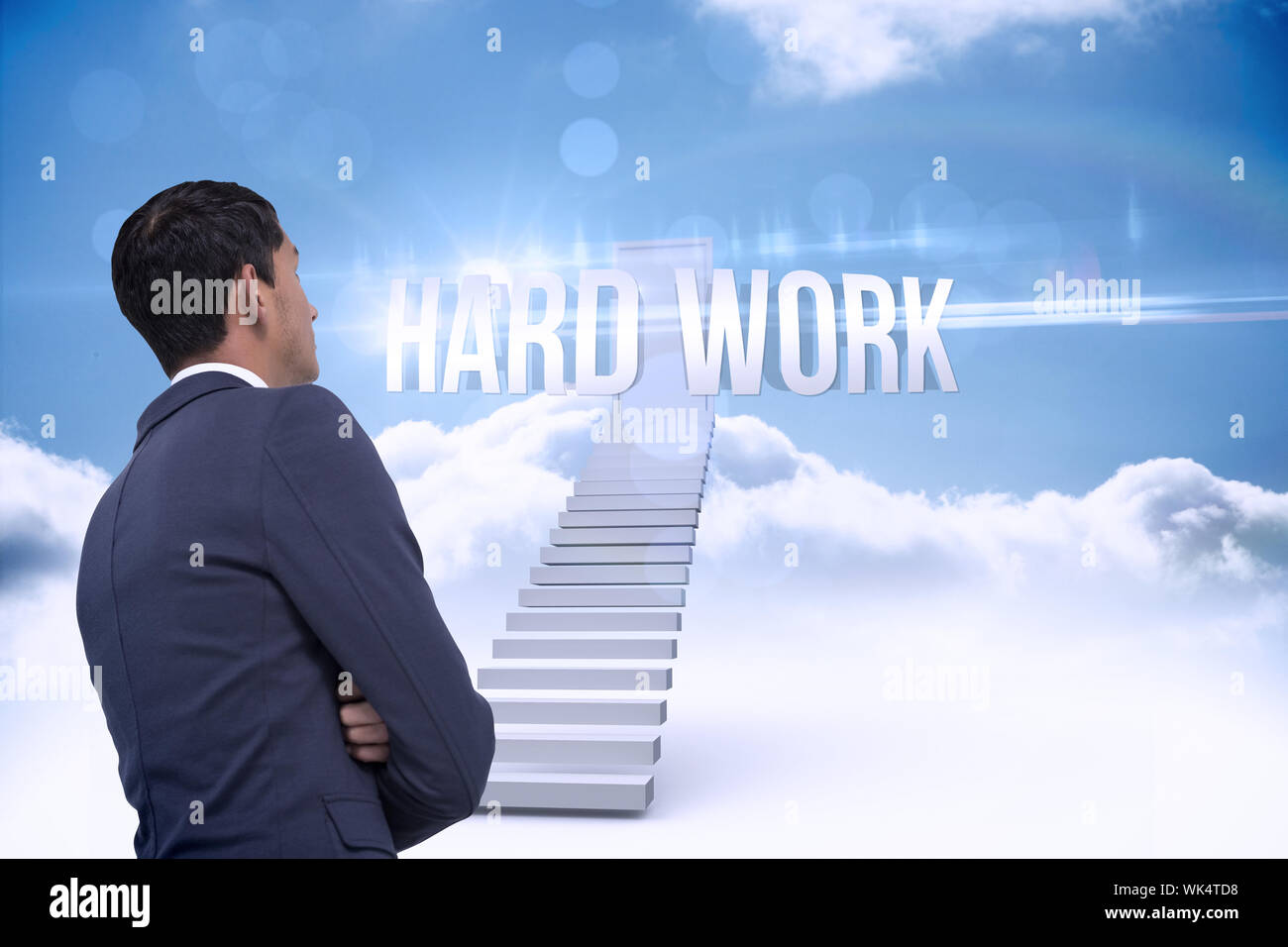The word hard work and unsmiling asian businessman with arms crossed ...