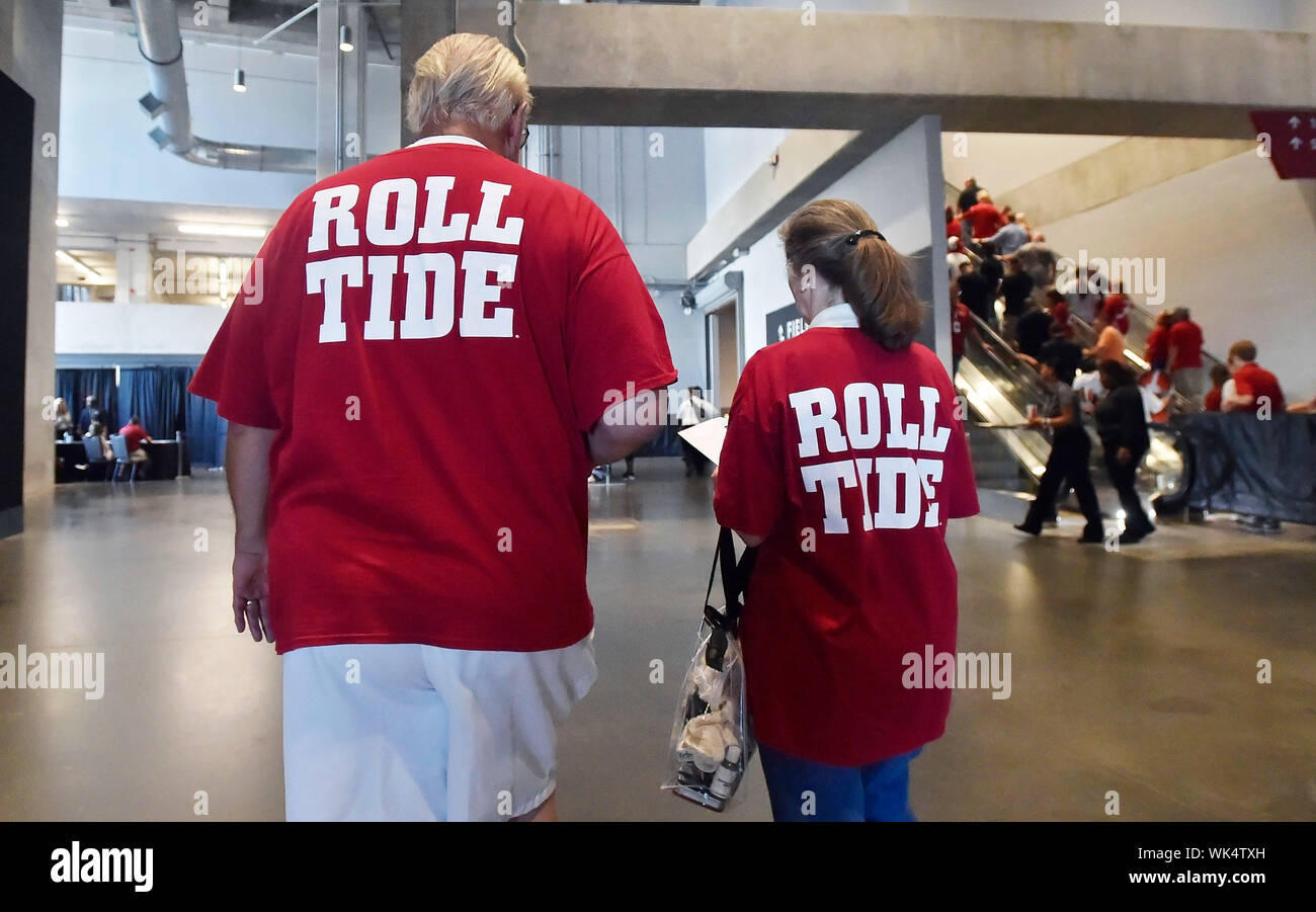 August 31, 2019: Two Alabama fans walk along the concourse before the ...