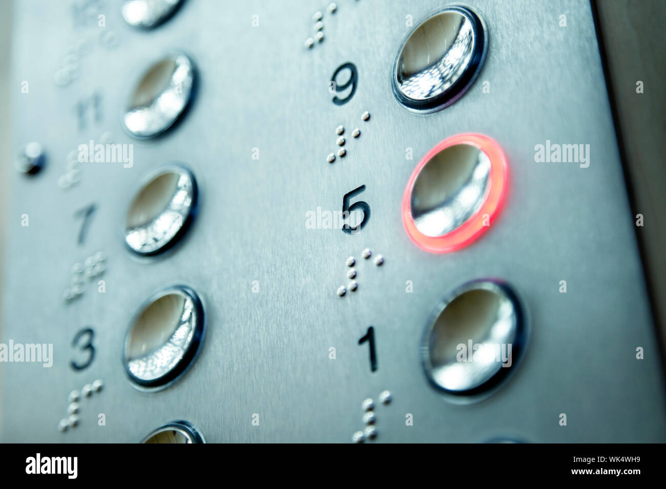 close up of elevator keypad with glowing button Stock Photo - Alamy