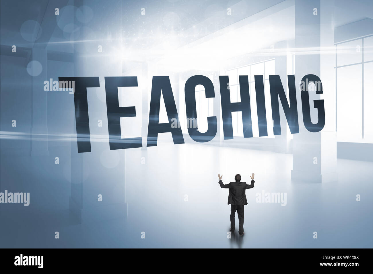 The word teaching and gesturing businessman against white room with ...