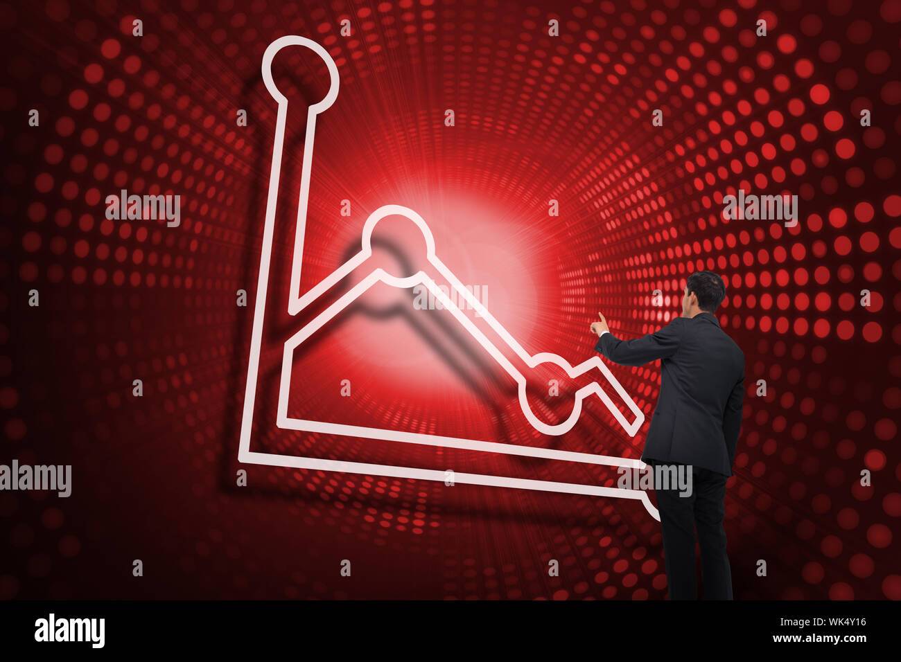 Composite image of graph and businessman pointing against red pixel ...