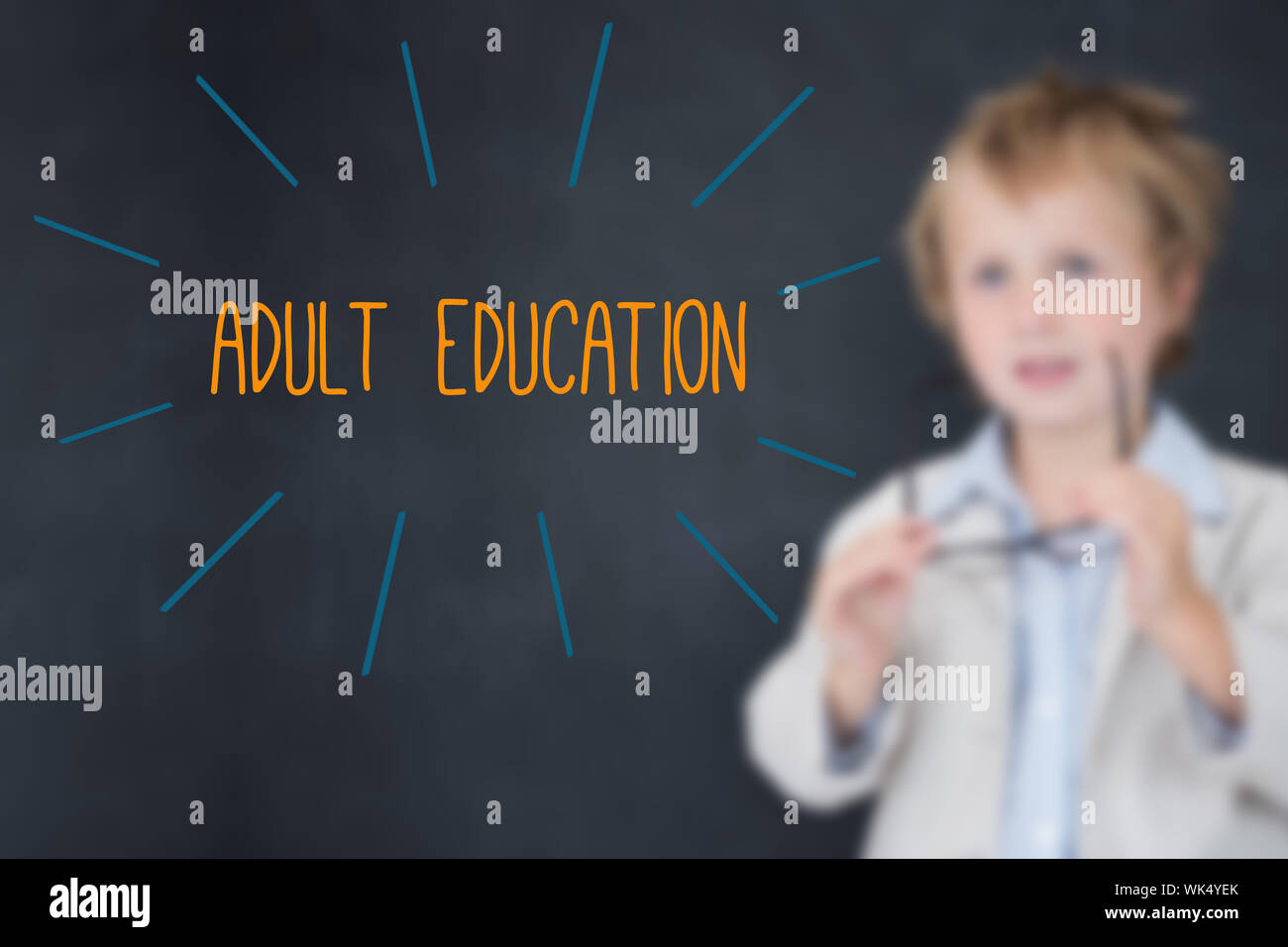 The word adult education against schoolboy and blackboard Stock Photo ...