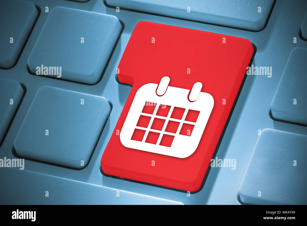 Calendar against red enter key on keyboard Stock Photo - Alamy