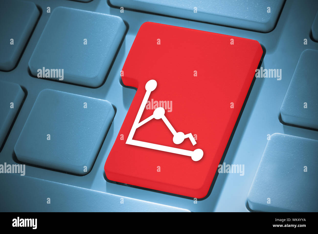 Graph against red enter key on keyboard Stock Photo - Alamy