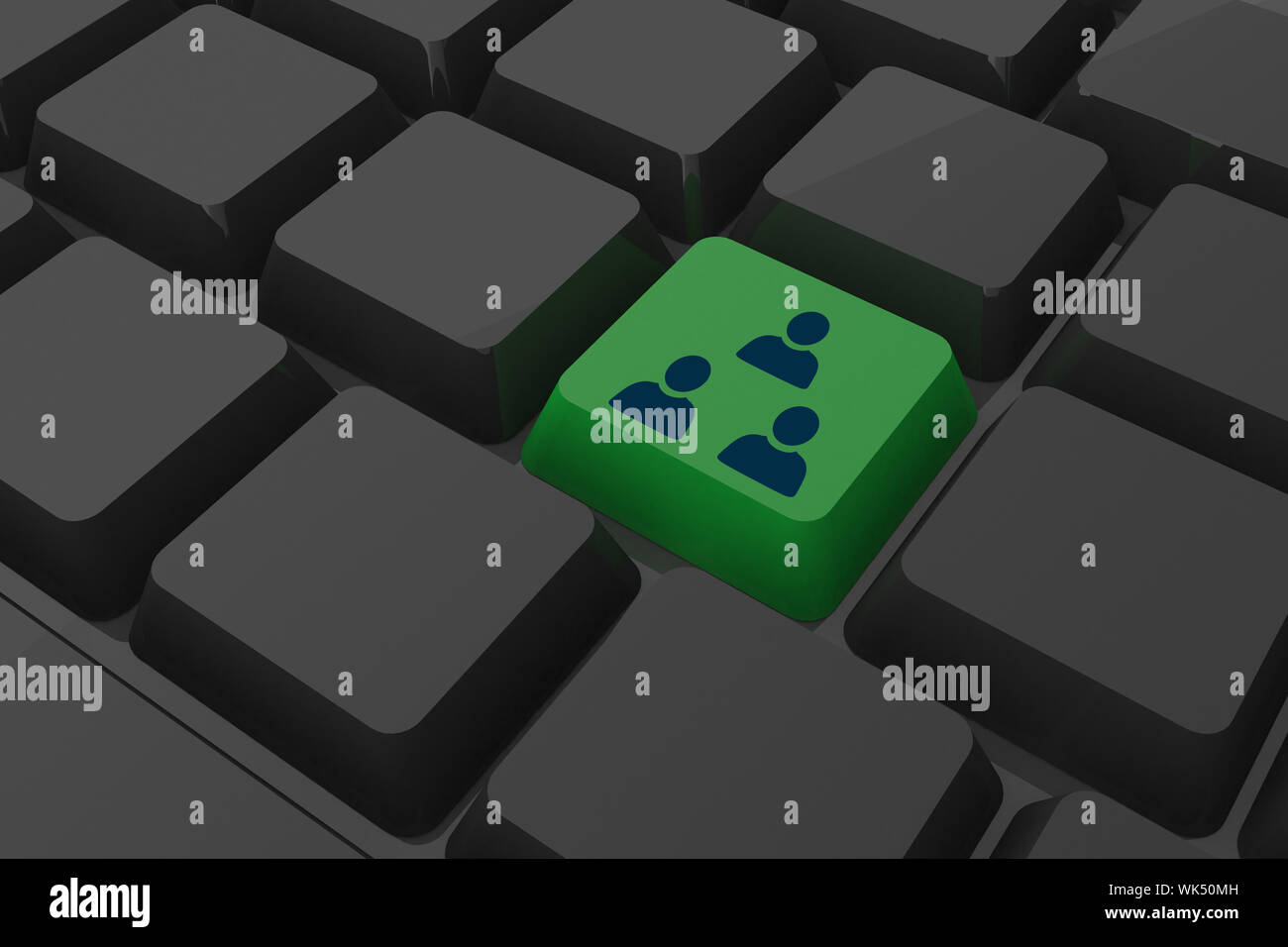 Human figures against black keyboard with green key Stock Photo - Alamy