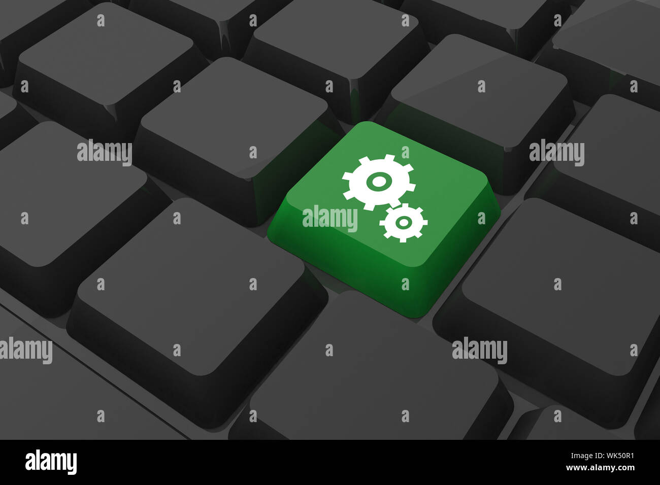 Cog and wheel against black keyboard with green key Stock Photo - Alamy