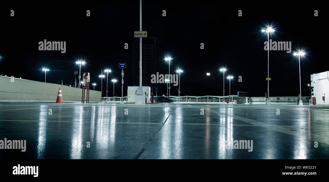 Empty Parking Lot At Night Stock Photo - Alamy