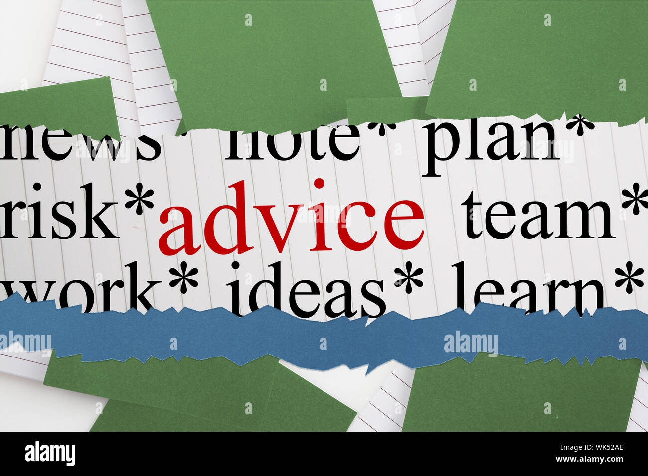 The word advice against green paper strewn over notepad Stock Photo - Alamy