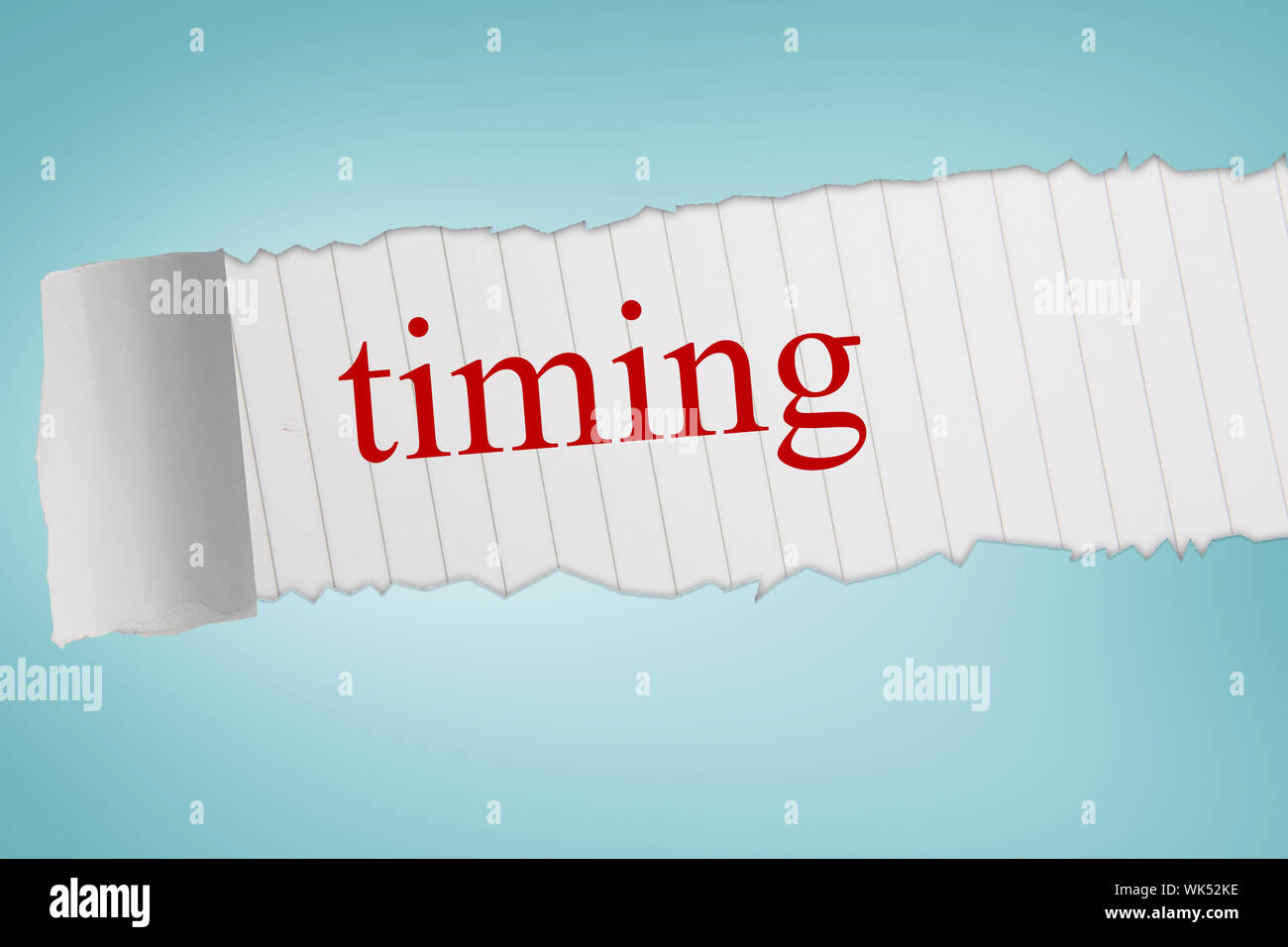 The word timing against blue vignette Stock Photo - Alamy
